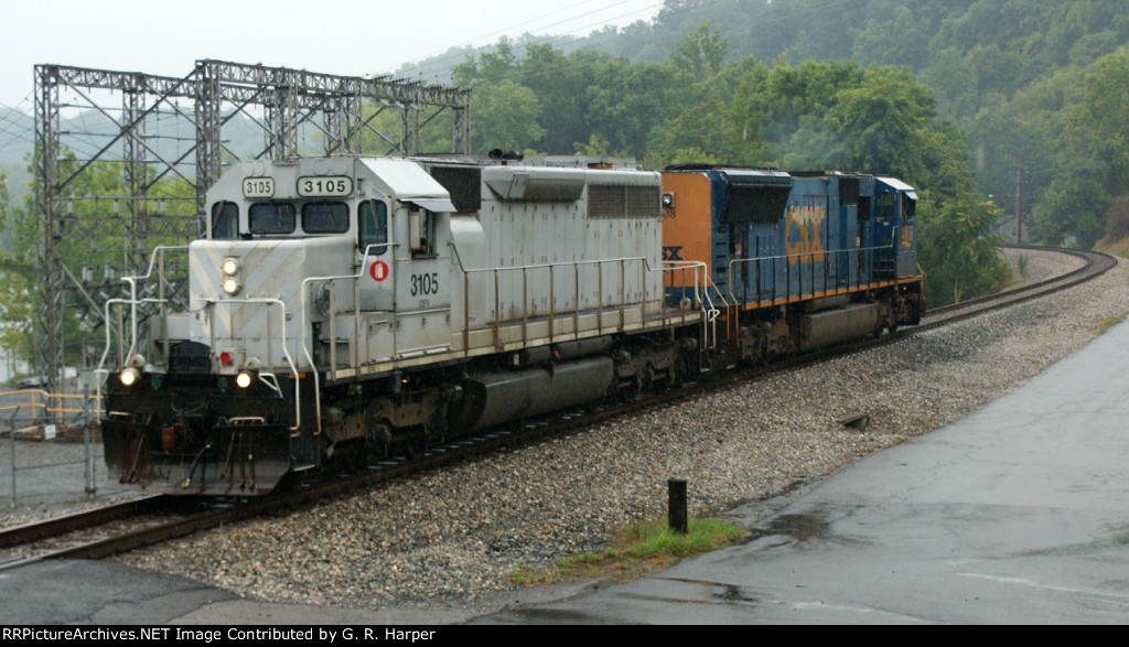 CEFX 3105 leads a two-unit lite engine move westbound past the transformer yard